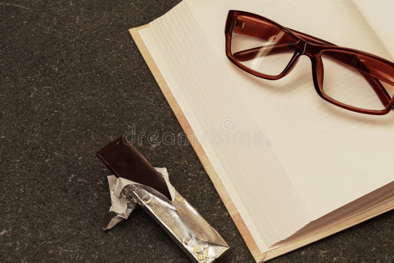 Glasses for Better Reading on an Open Book from Above Stock Photo ...