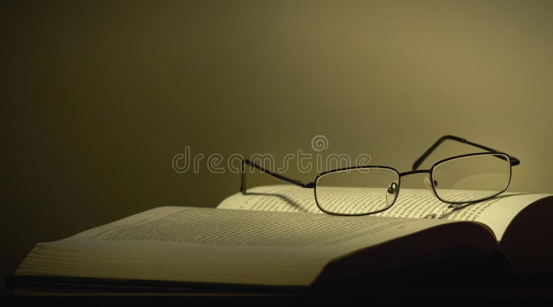 Glasses and a book stock image. Image of educate, glasses - 22323733