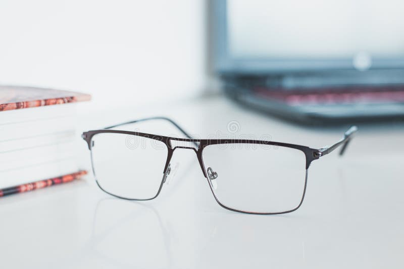 Glasses with Book and Laptop Stock Image - Image of lens, glasses ...