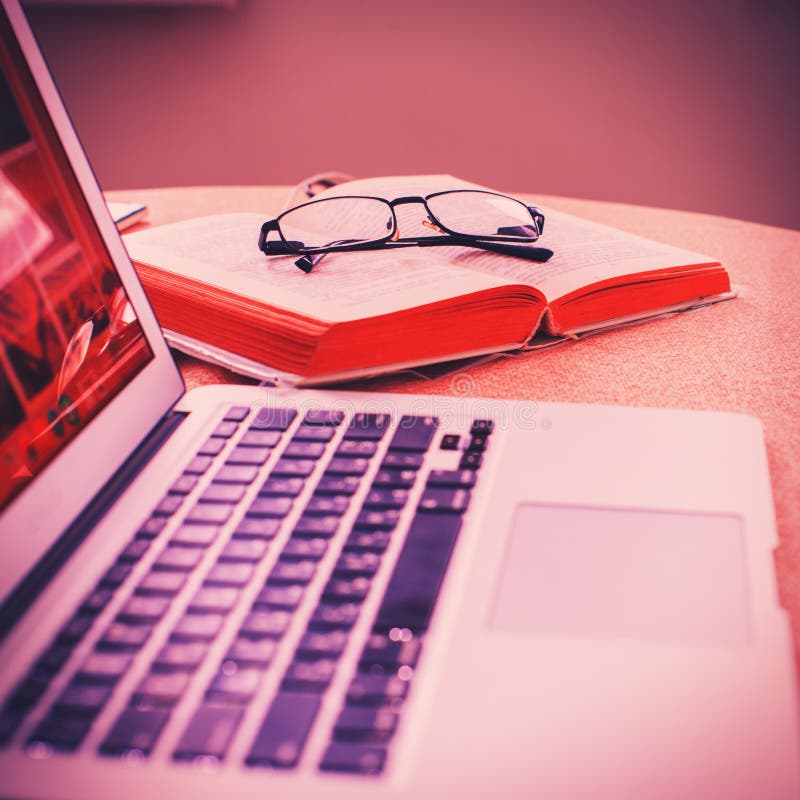 Glasses , Book and Open Laptop Stock Photo - Image of table, eyeglasses ...