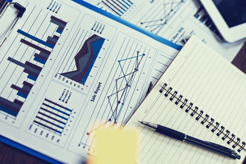 Glasses, Book, Paper Graph and Tablet on the Table. Object of Business ...