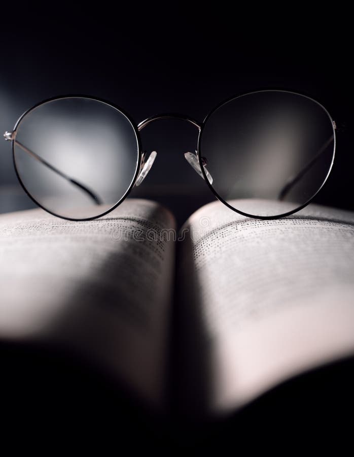 Glasses on book stock image. Image of sunglasses, goggles - 203479333