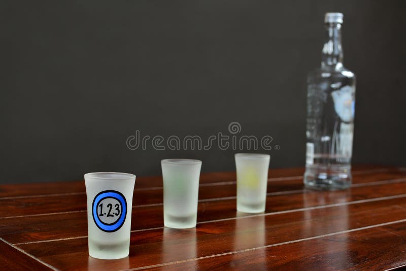 Glasses and Bottle of Vodka on the Table Stock Image - Image of vodka ...