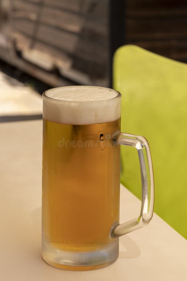 Glasses of refreshing beer stock image. Image of restaurant - 256687163