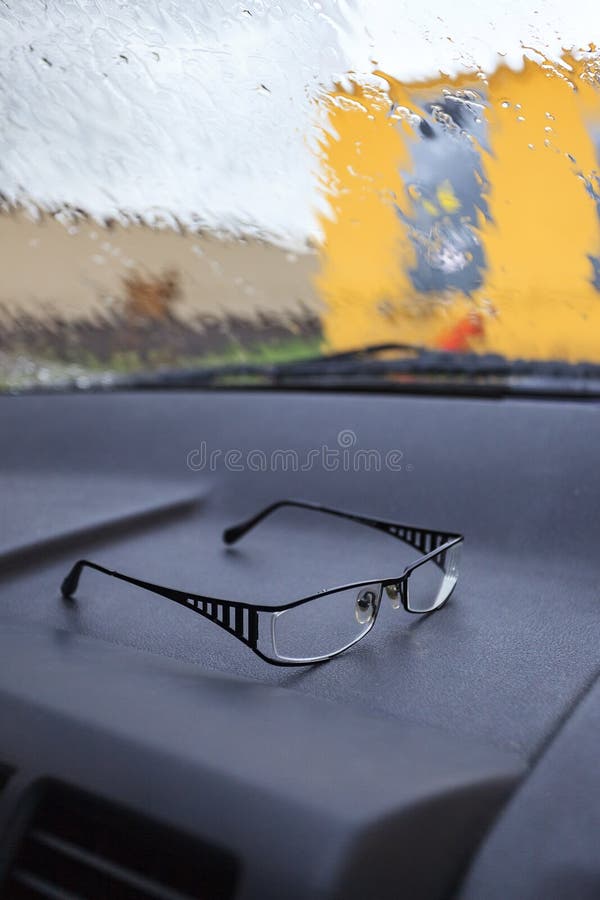 Glasses in the car stock image. Image of interior, board - 94685523