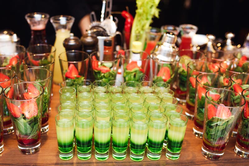 Glasses with Cocktail Drinks on the Bar Table. Stock Image - Image of ...