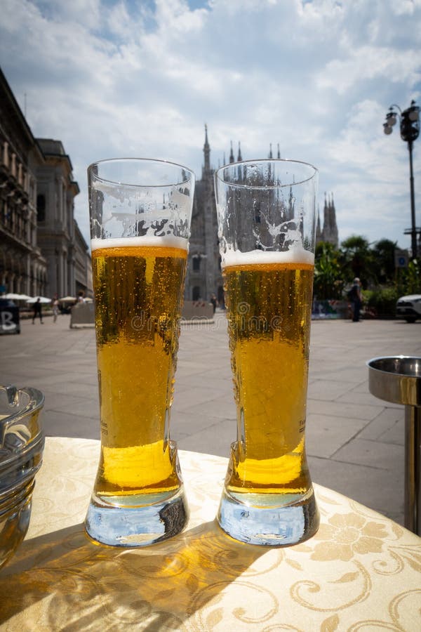 2 Glasses of Cold Beer Stand Side by Side on a Table Stock Image ...