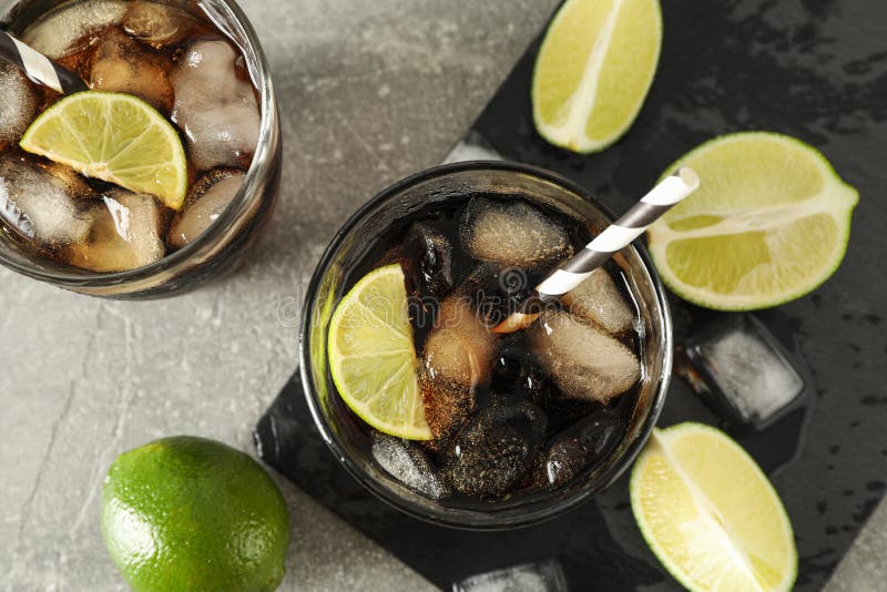 Glasses with Cold Cola and Citrus on Grey Table Stock Photo - Image of ...