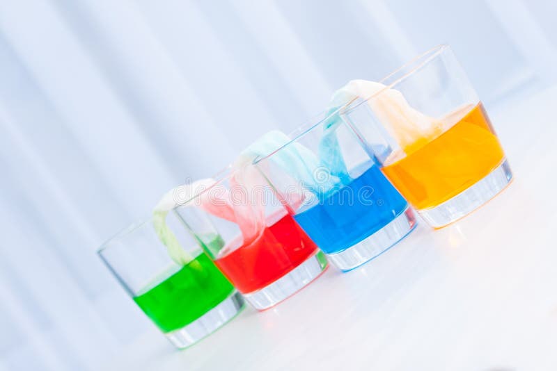 Glasses with Colored Liquid. Chemical Experiments for Children Stock ...