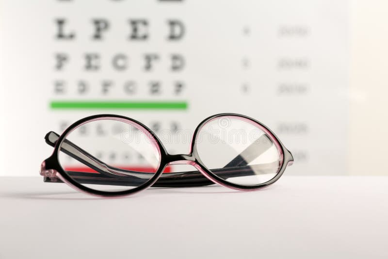Glasses with Corrective Lenses on Table Stock Image - Image of doctor ...