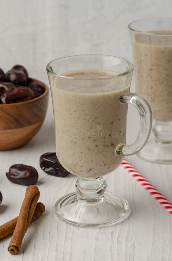 Glasses of Date Milkshake with Cinnamon and Spice Stock Image - Image ...