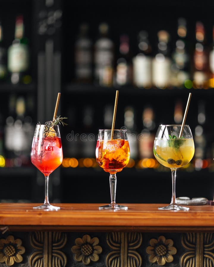 Glasses of Different Fruit Cocktails on Bar Desk Stock Image - Image of ...