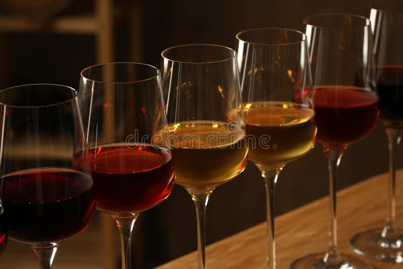 Glasses of Different Wines in Cellar. Expensive Collection Stock Image ...