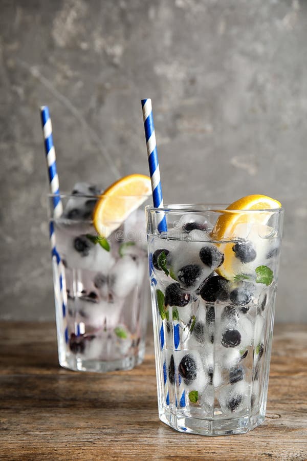 Glasses of Drink with Blueberry Ice Cubes Stock Image - Image of iced ...