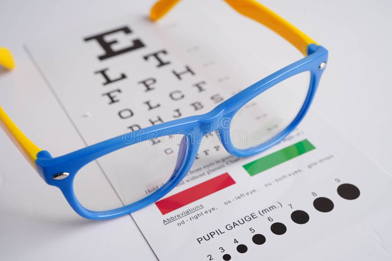 Glasses on Eye Exam Chart To Test Eyesight Accuracy of Reading Stock ...