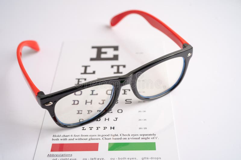 Glasses on Eye Testing Exam Chart To Check Eyesight Accuracy of Reading ...