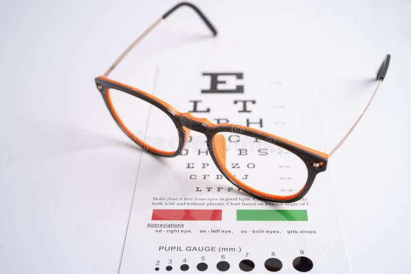 Glasses on Eye Testing Exam Chart To Check Eyesight Accuracy of Reading ...