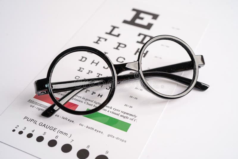 Glasses on Eye Testing Exam Chart To Check Eyesight Accuracy of Reading ...