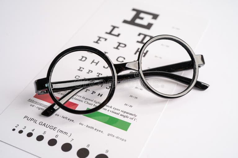 Glasses on Eye Testing Exam Chart To Check Eyesight Accuracy of Reading ...