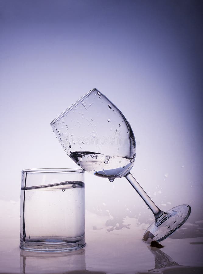 Glasses Filled with Water, Water Pours into a Glass with Splashes Stock ...