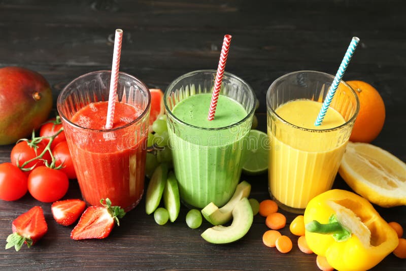 Glasses with Fresh Tasty Smoothies and Ingredients on Table Stock Photo ...