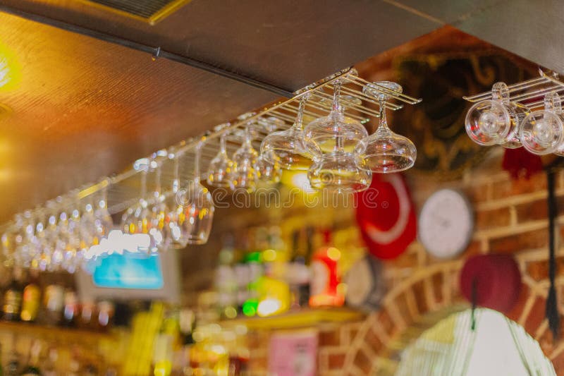 Glasses Hanging Over the Bar in the Restaurant Stock Photo - Image of ...