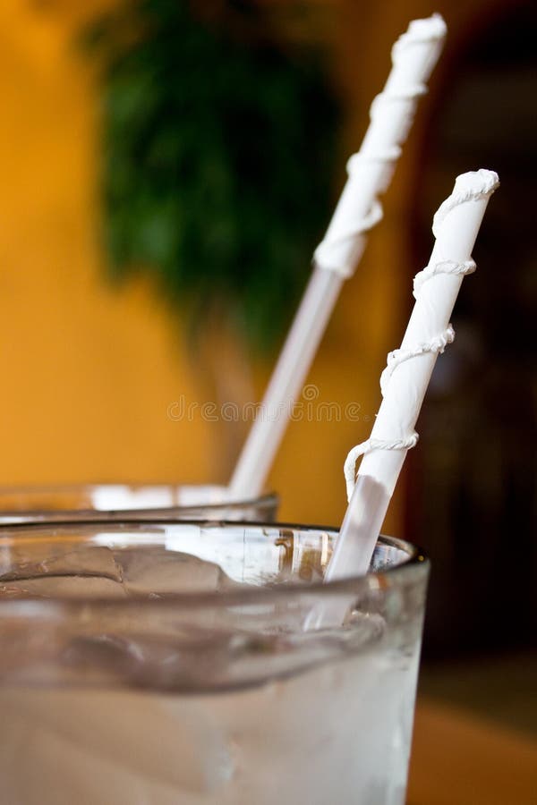 Glasses of Ice Water with Straws with Their Paper Twisted Around Stock ...