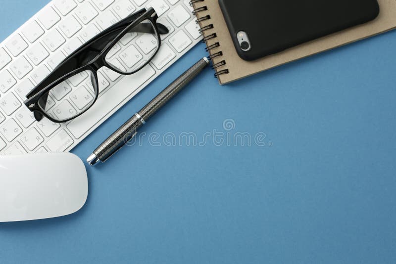 Glasses Keyboard Mouse Pen Notepad and Diary on Orange Background Stock ...
