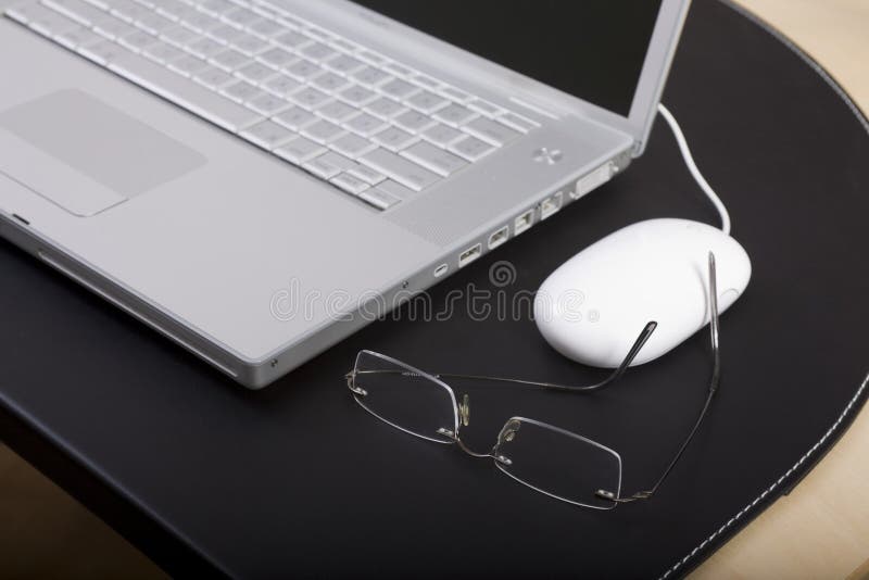 Glasses and Laptop Computer Stock Photo - Image of desk, computer: 4365948