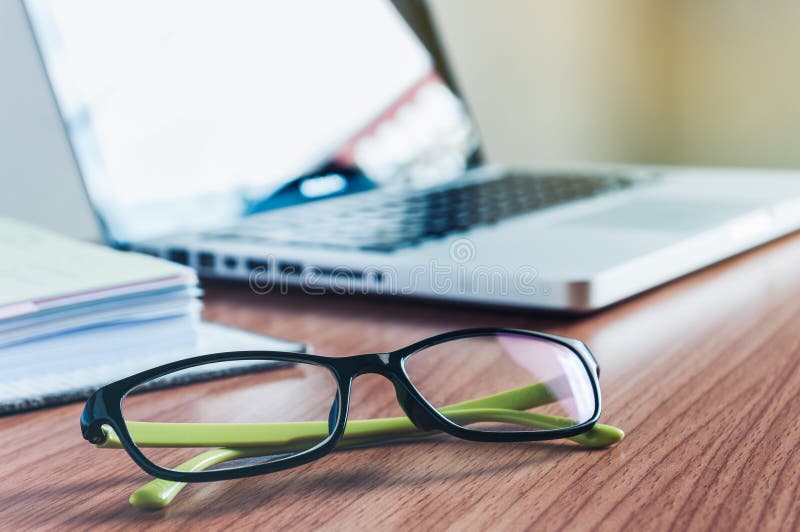 Glasses and Laptop on the Desk Stock Image - Image of paper, flat ...