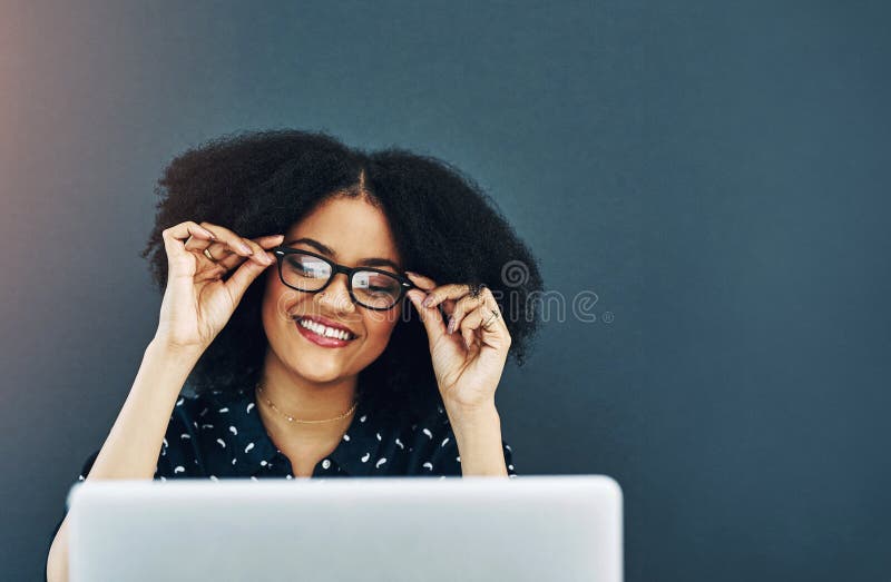Glasses, Laptop and Smile with Designer Woman in Studio on Blue ...