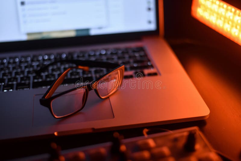 Glasses and a Laptop on the Table Stock Image - Image of social, orange ...