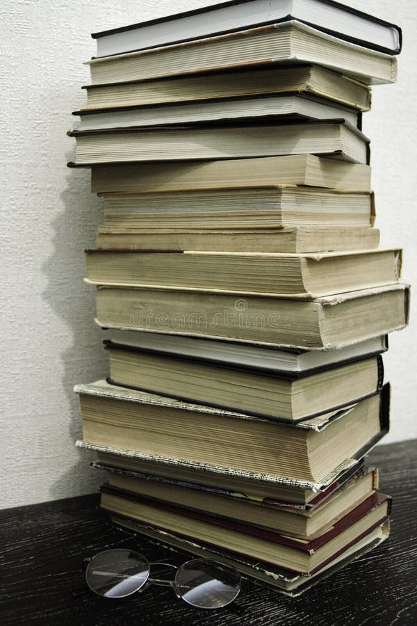 Stack of books stock image. Image of glasses, book, news - 163766435
