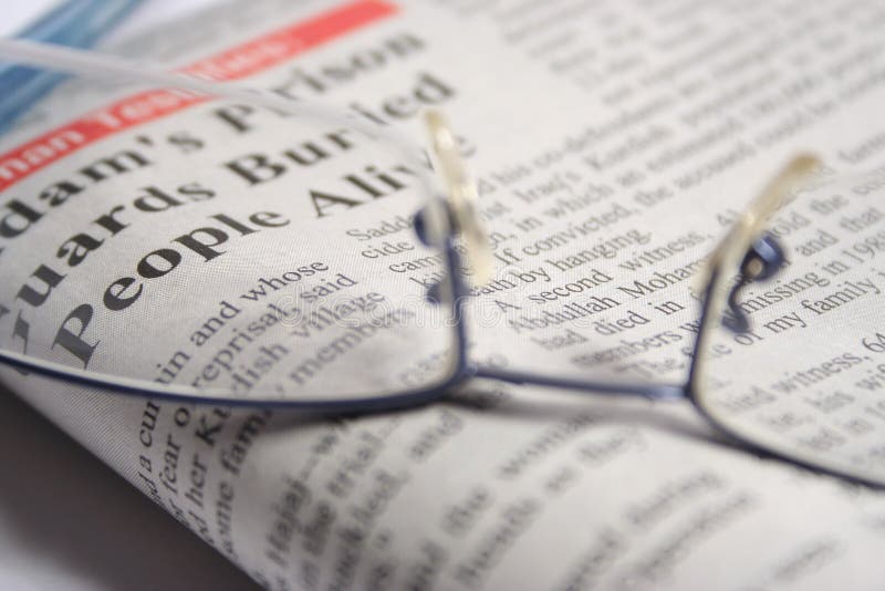 Glasses on a newspaper stock photo. Image of report, periodical - 388070