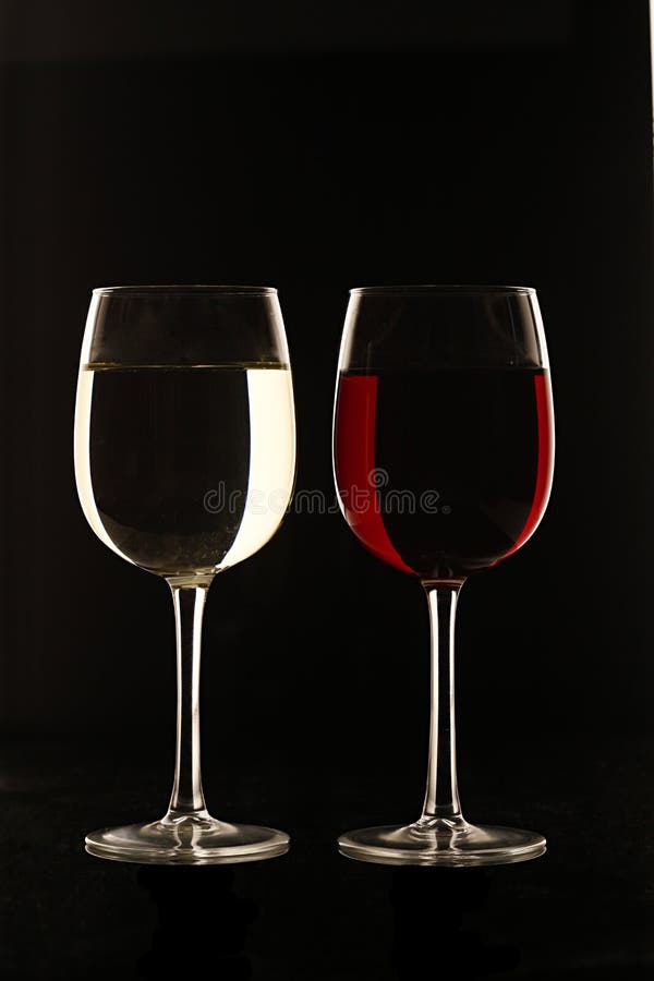 Wine Glasses with Red and White Wine Bottles Stock Image - Image of ...