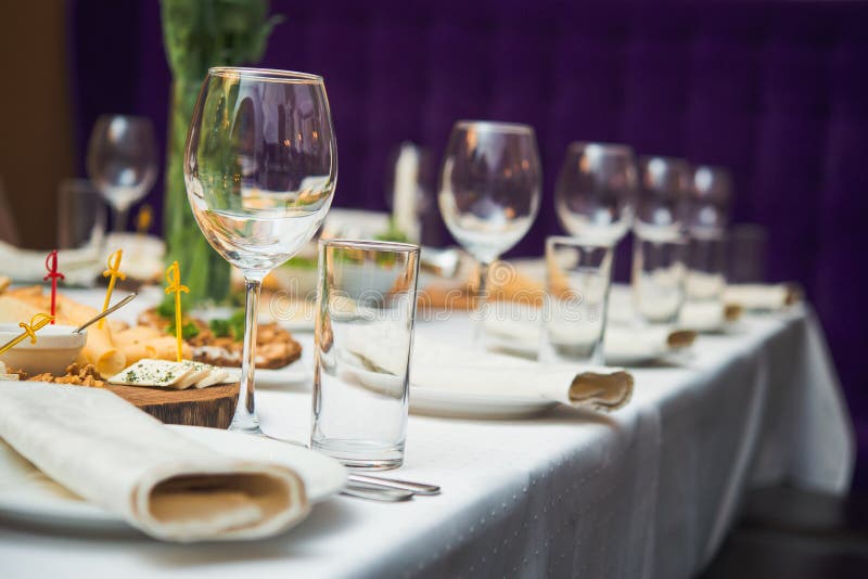 Glasses on restaurant stock photo. Image of dining, decoration - 67519190