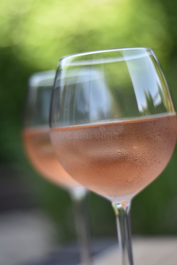 Glasses of Rose Wine on the Table Stock Image - Image of close, beer ...