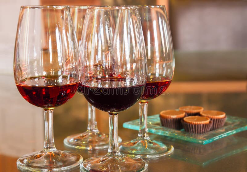Glasses of ruby port wine stock photo. Image of table - 44427480