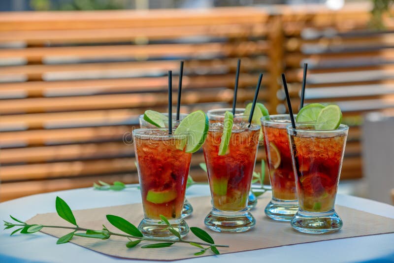 Glasses with rum cocktail stock photo. Image of lemon - 112414346