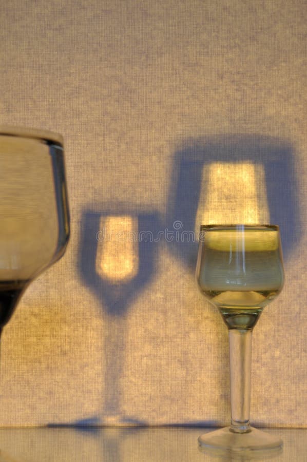 Glasses and shadows stock photo. Image of abstract, glasses - 54731720