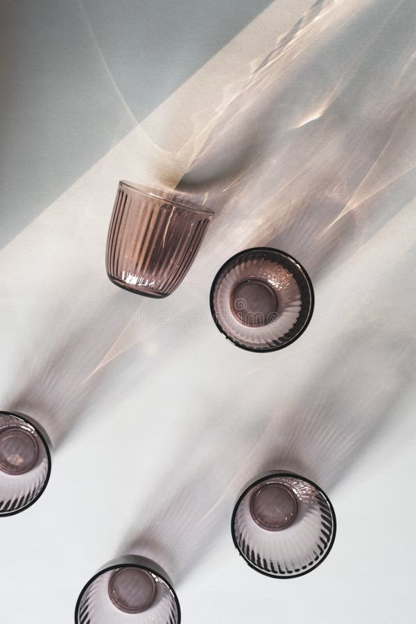 Glasses with Shadows in Sunlight. Still Life Stock Photo - Image of ...