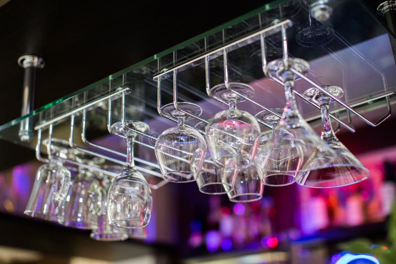 Glasses in Shelf Above a Bar Rack Stock Image - Image of local, public ...