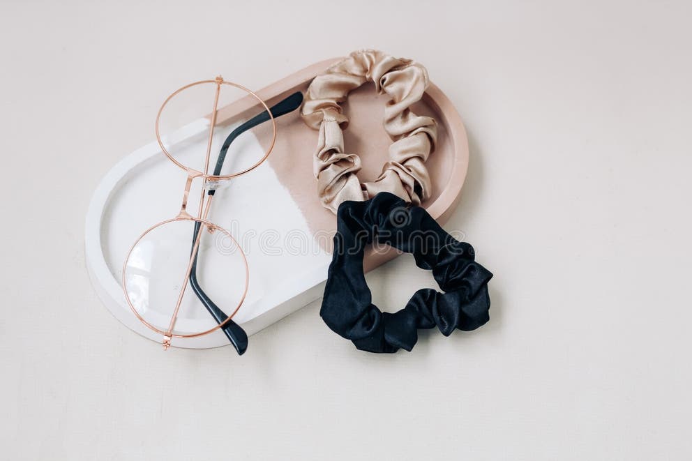 Glasses with Silk Elastic Bands in Plaster Organizer Stock Image ...