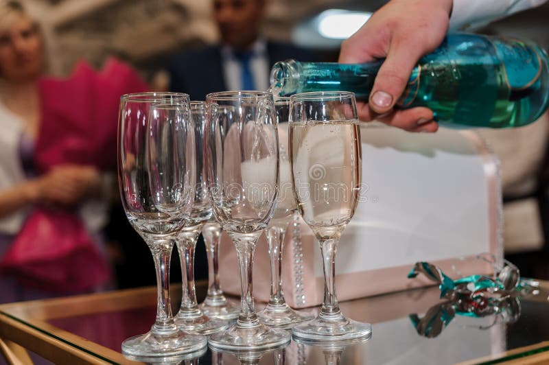 Glasses of White Sparkling Wine on the Table. Serving Wine Stock Image ...