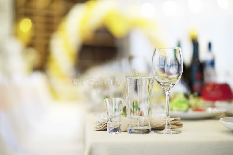 Glasses on the Table in the Restaurant. Table Setting. Stock Photo ...