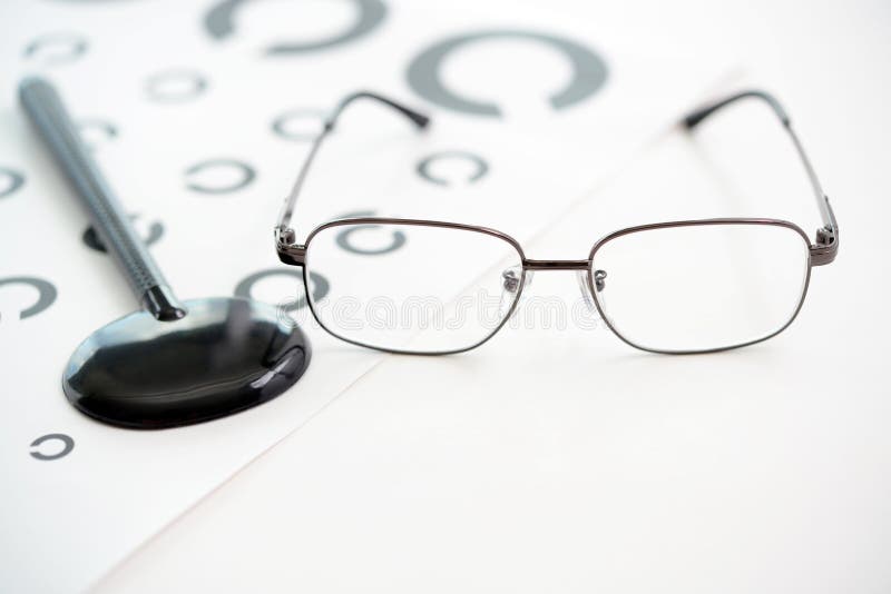 Glasses with Landolt Ring Chart Stock Photo - Image of experiment ...
