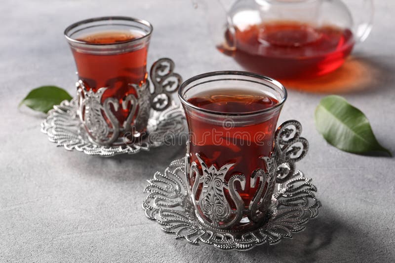 Glasses of Traditional Turkish Tea in Vintage Holders on Light Grey ...