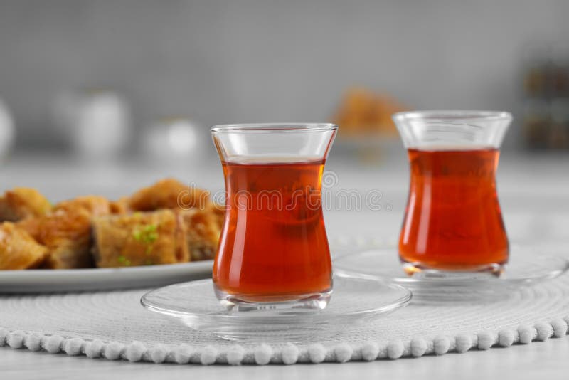 Glasses of Traditional Turkish Tea on White Table Indoors Stock Photo ...