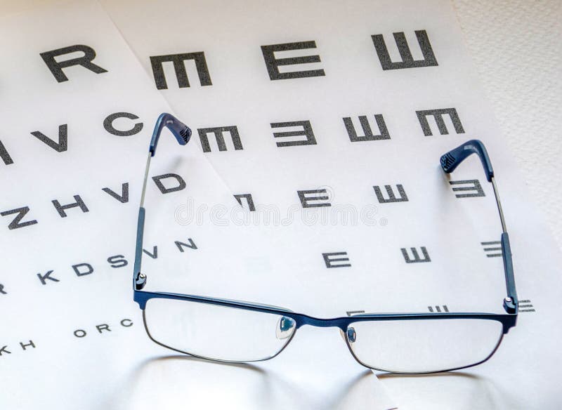Glasses on Vision Correction Tests. Stock Photo - Image of temples ...