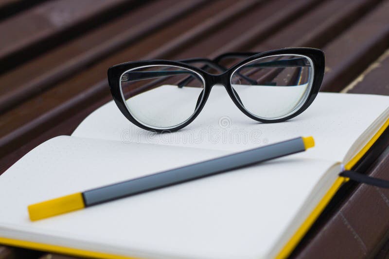 Glasses for Vision on a Notepad with a Marker, Study Concept. Stock ...